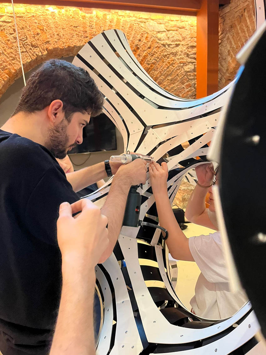 Stripped and layered fabrication of minimal surface tectonics using parametric algorithms